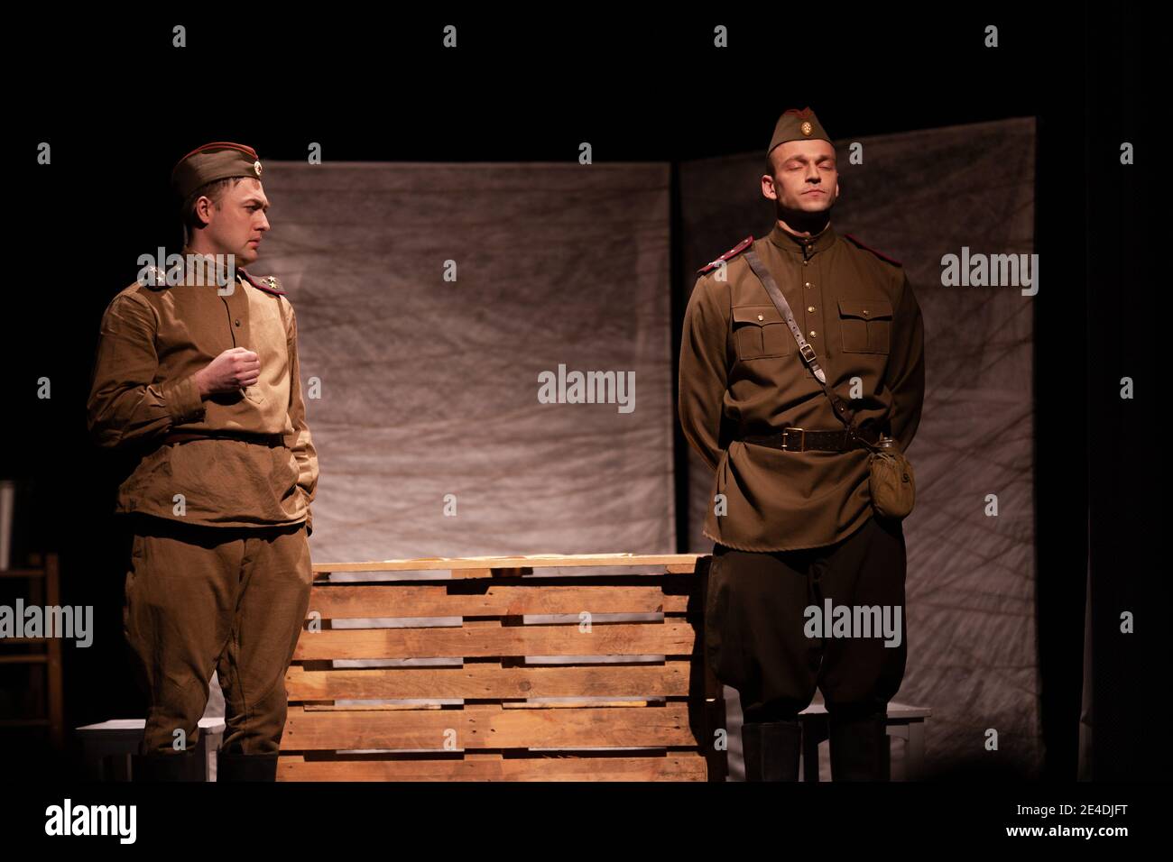 Actors in military uniforms of the Soviet army of World War II play a ...