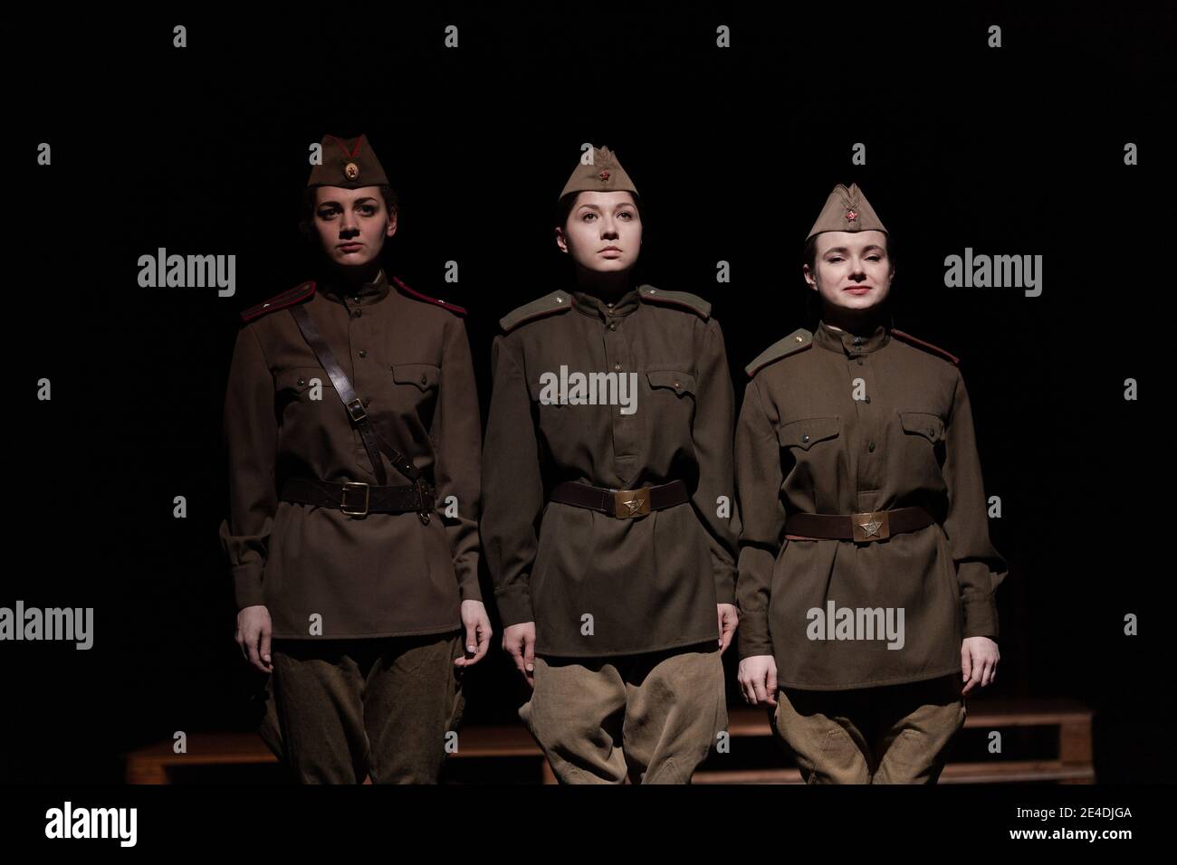 Actors in military uniforms of the Soviet army of World War II play a ...
