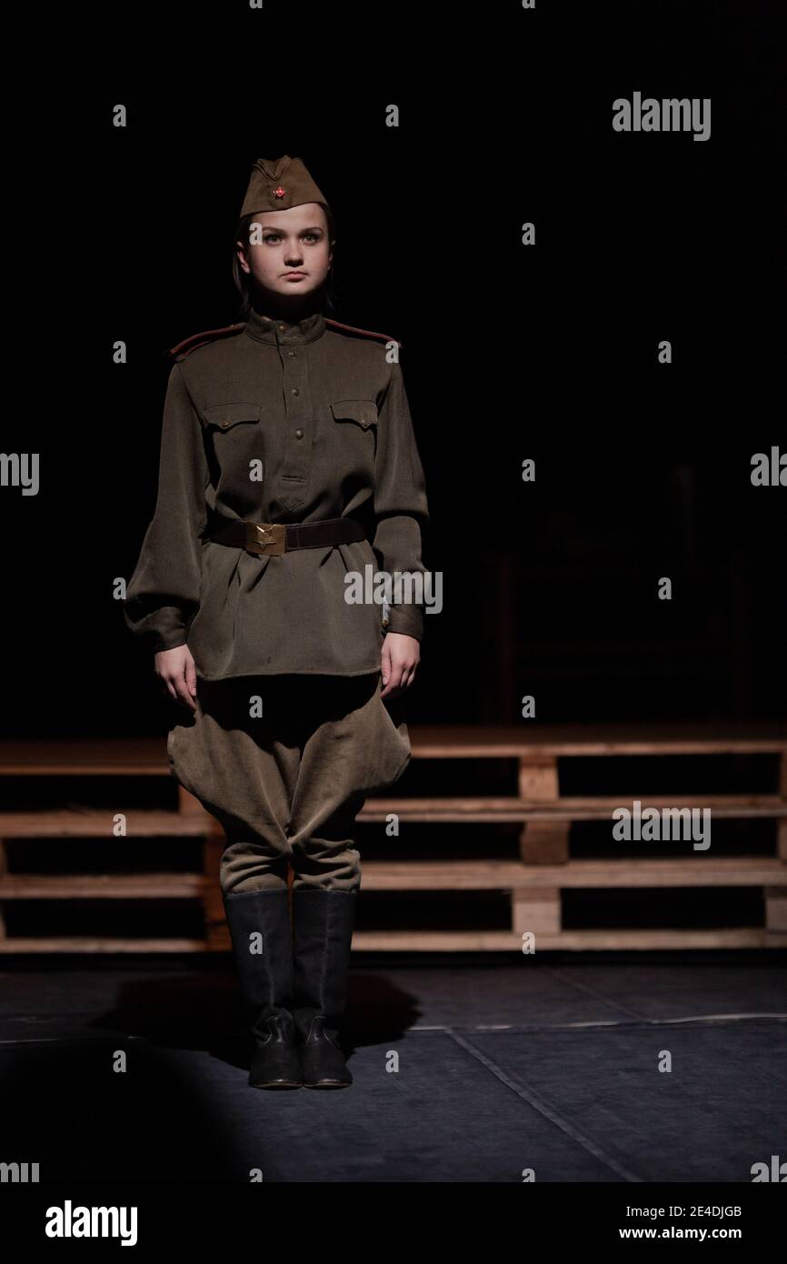Actors in military uniforms of the Soviet army of World War II play a ...