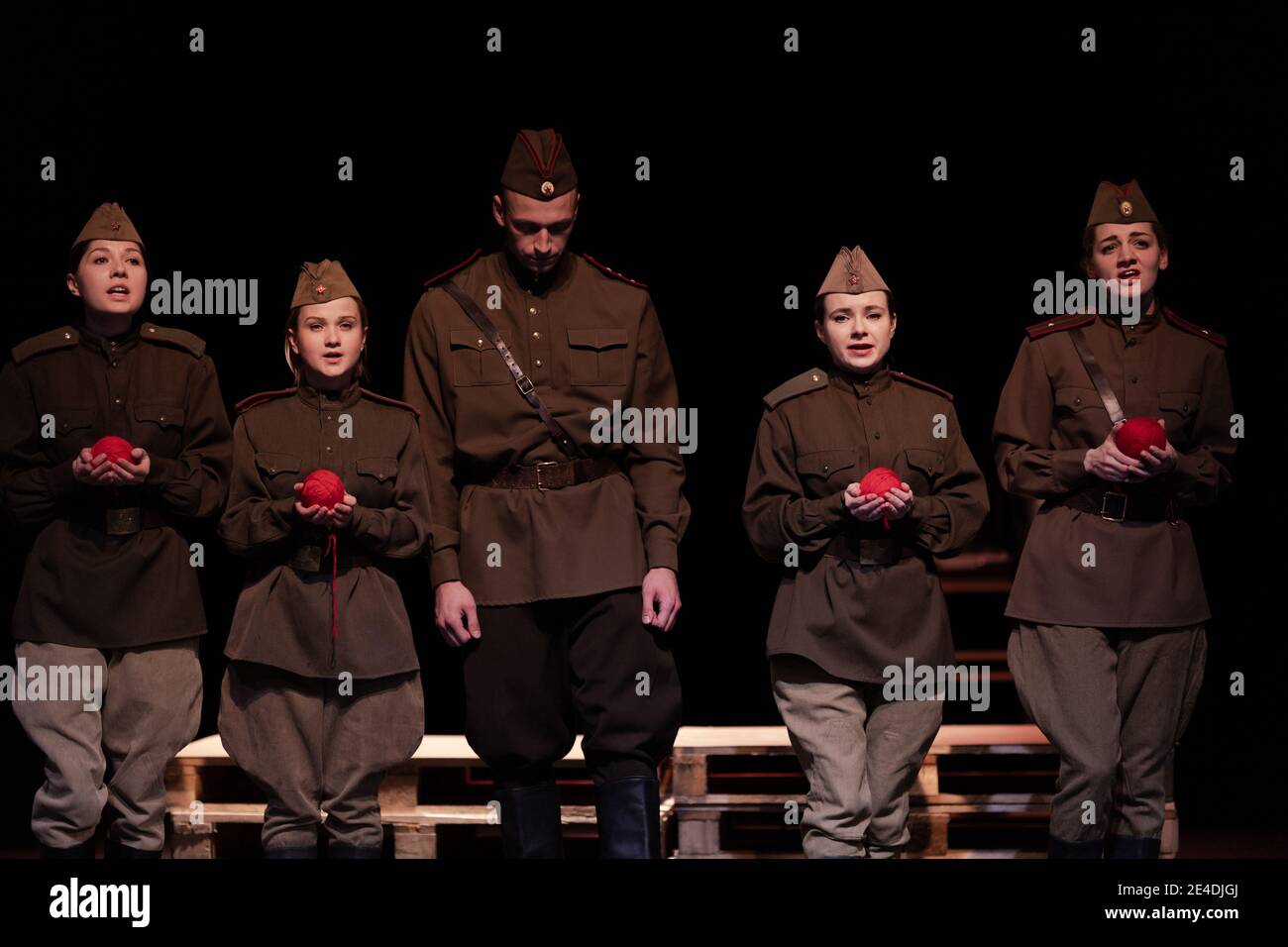 Actors in military uniforms of the Soviet army of World War II play a ...
