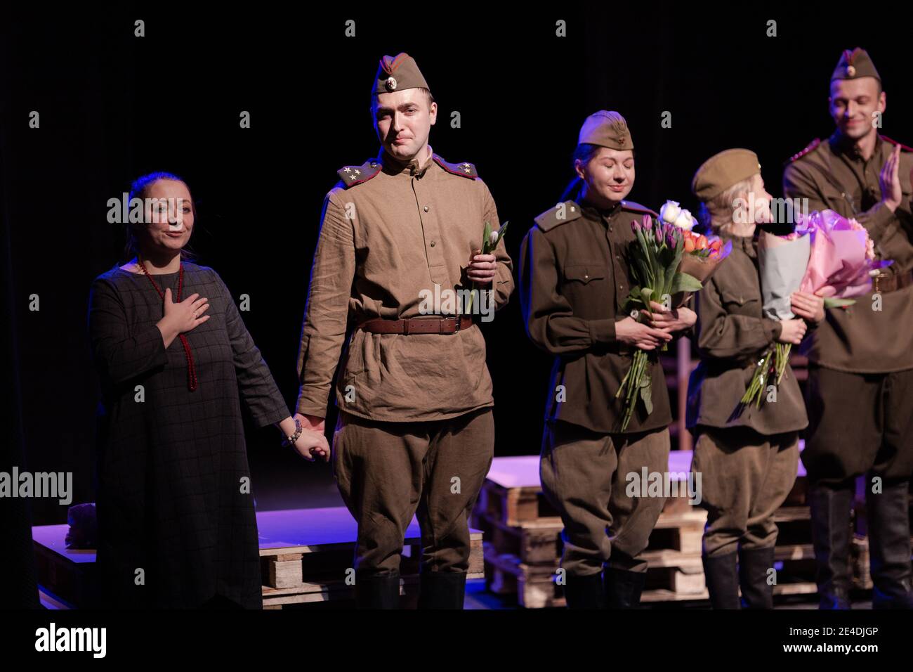 Actors in military uniforms of the Soviet army of World War II play a ...