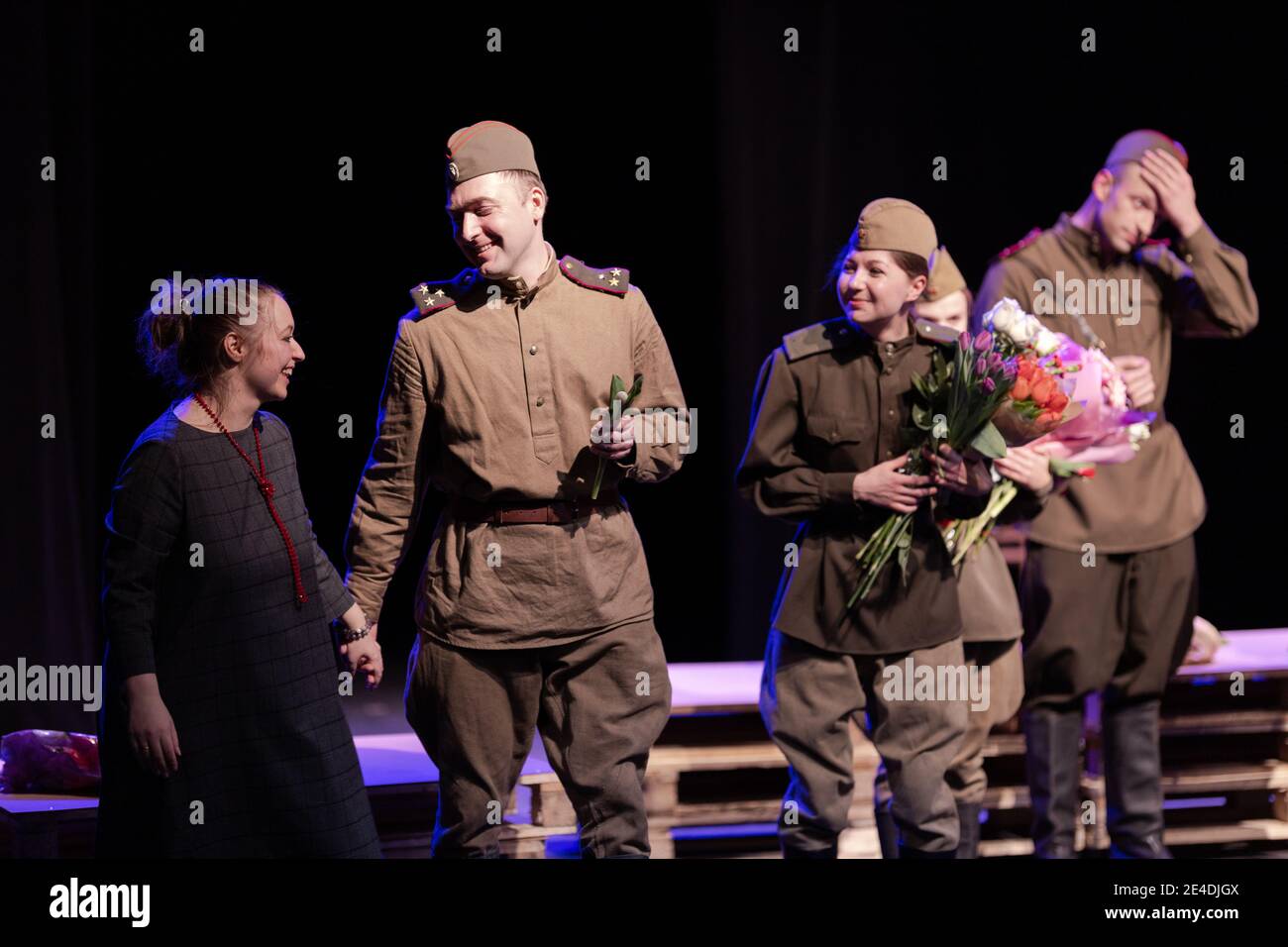 Actors in military uniforms of the Soviet army of World War II play a ...