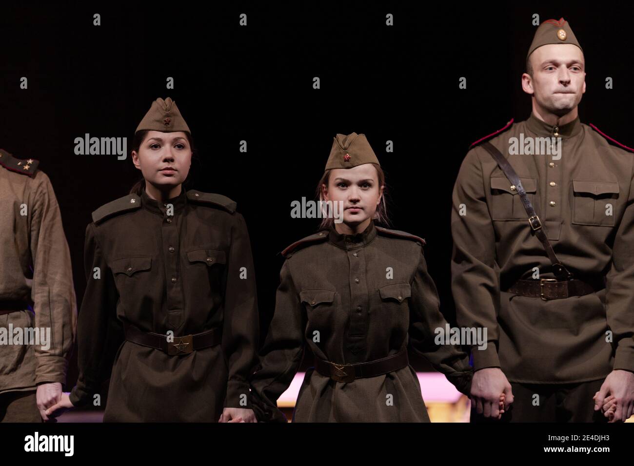 Actors in military uniforms of the Soviet army of World War II play a ...