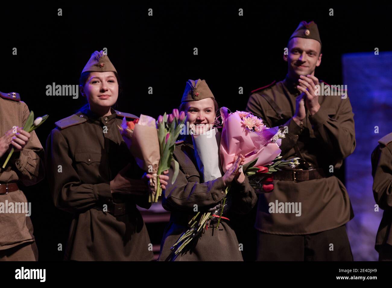 Actors in military uniforms of the Soviet army of World War II play a ...