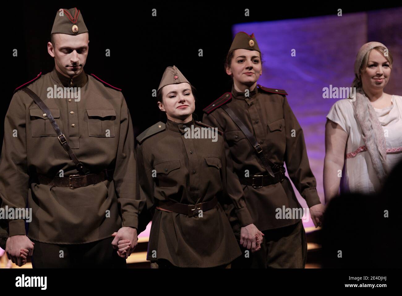 Actors in military uniforms of the Soviet army of World War II play a ...