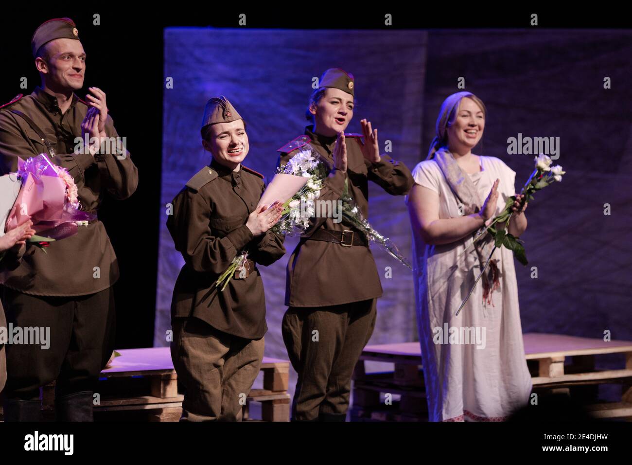 Actors in military uniforms of the Soviet army of World War II play a ...