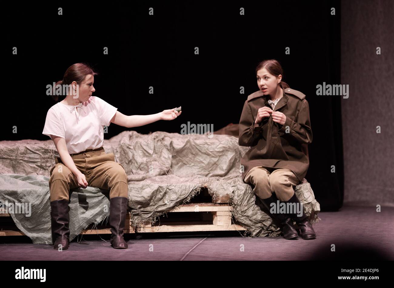 Actors in military uniforms of the Soviet army of World War II play a ...