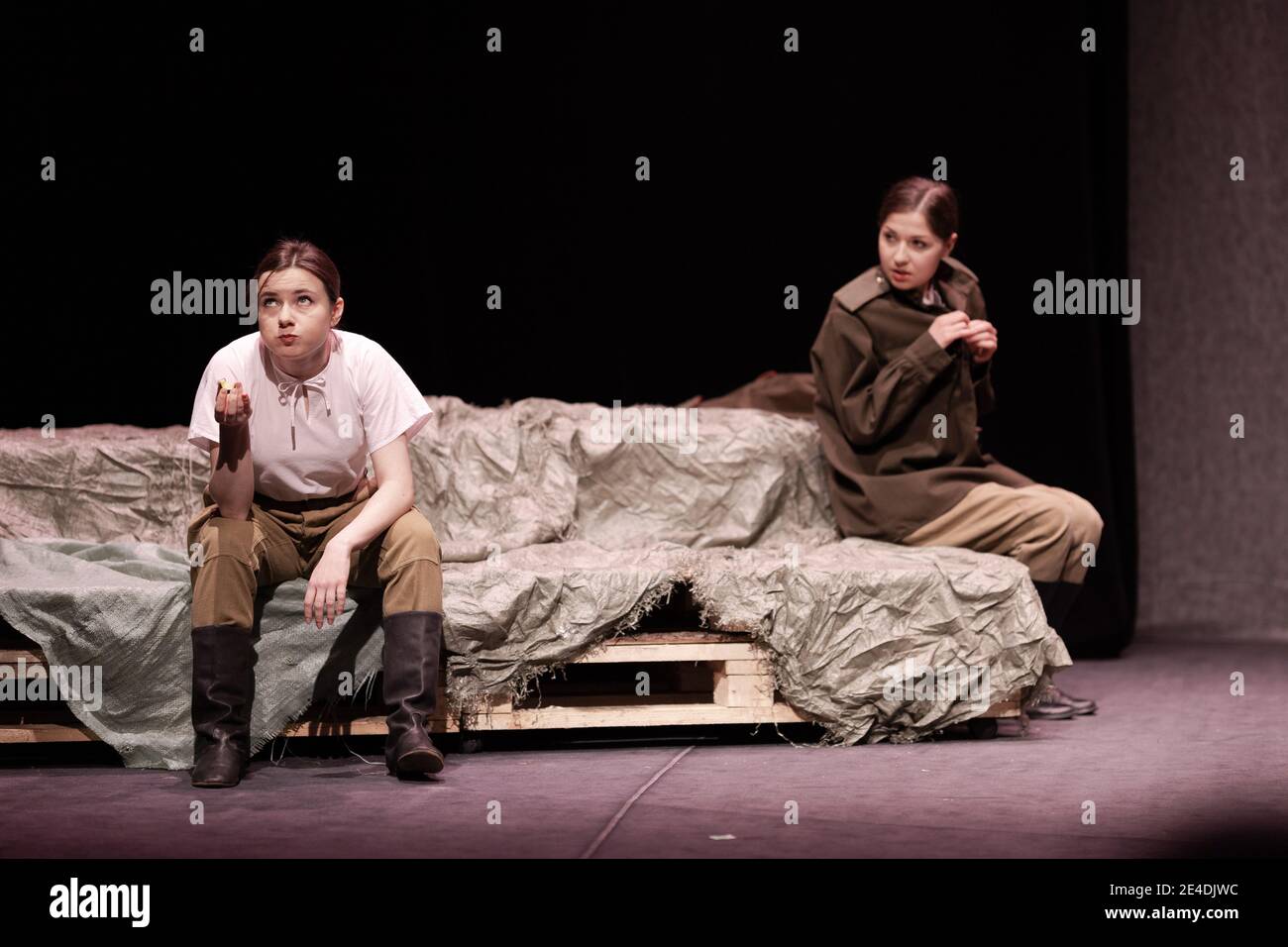 Actors in military uniforms of the Soviet army of World War II play a ...