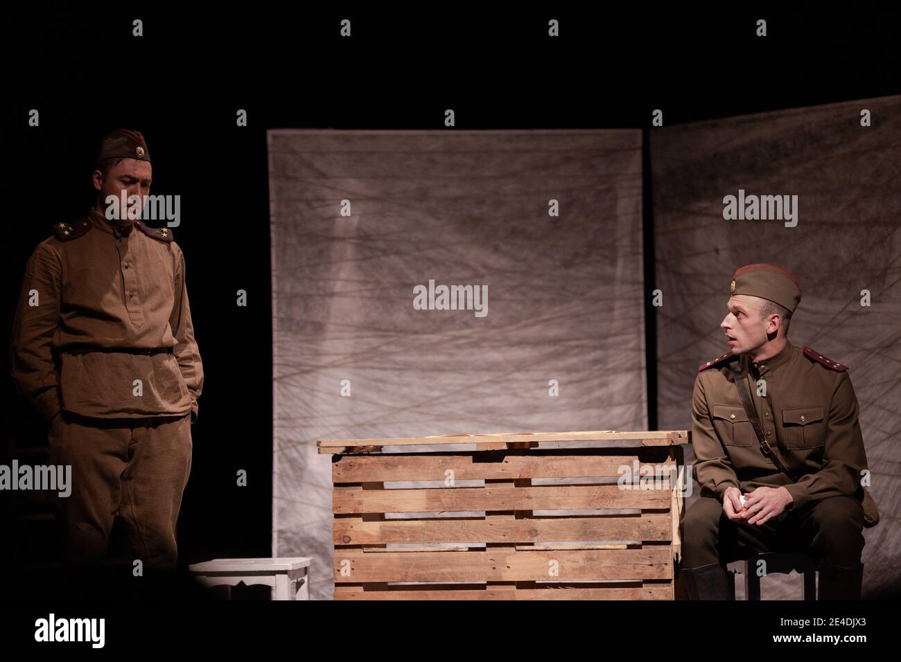 Actors in military uniforms of the Soviet army of World War II play a ...