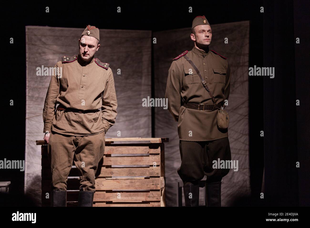 Actors in military uniforms of the Soviet army of World War II play a ...