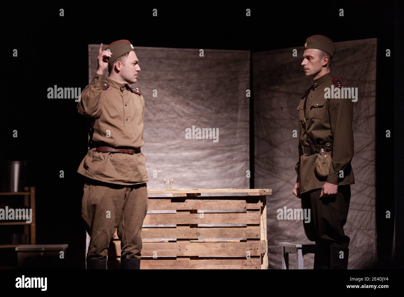 Actors in military uniforms of the Soviet army of World War II play a ...