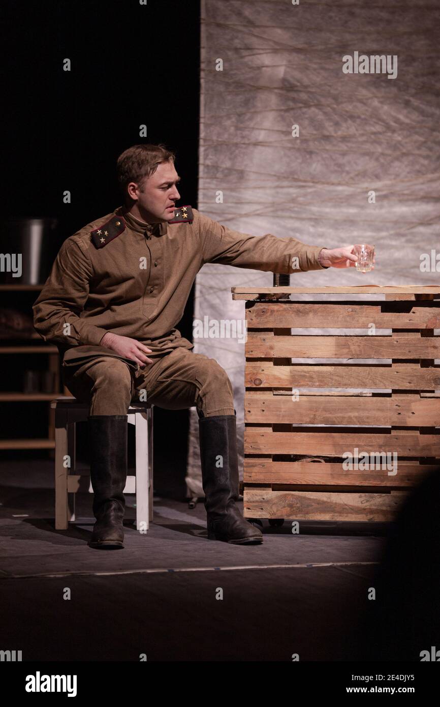 Actors in military uniforms of the Soviet army of World War II play a ...