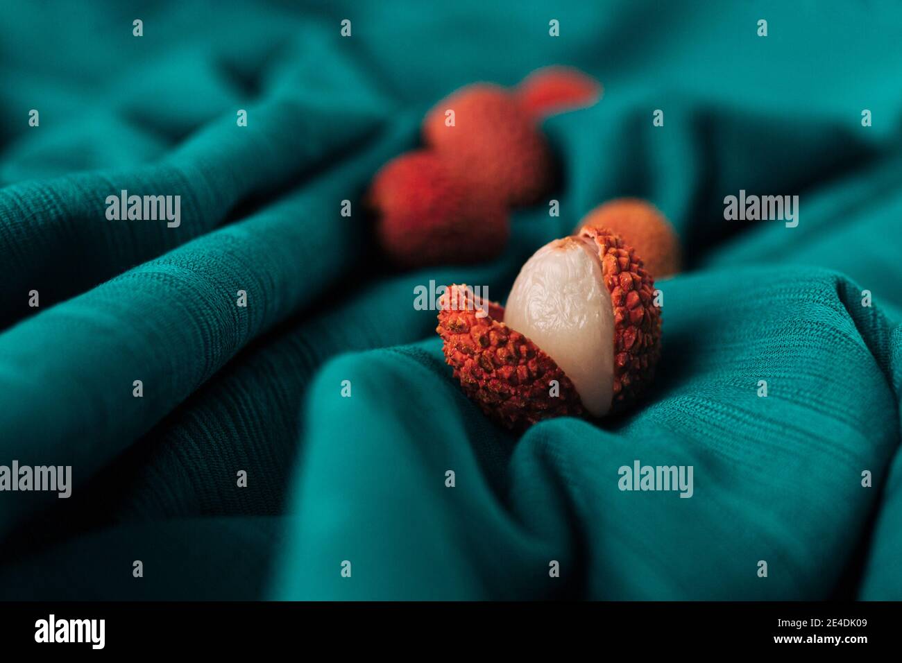 Closeup aesthetic of fresh organic Lychee (Litchi fruit) against dark ...