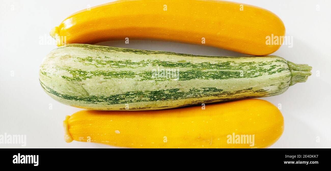Two yellow and one green courgettes, pumpkin, São Paulo, Brazil Stock ...