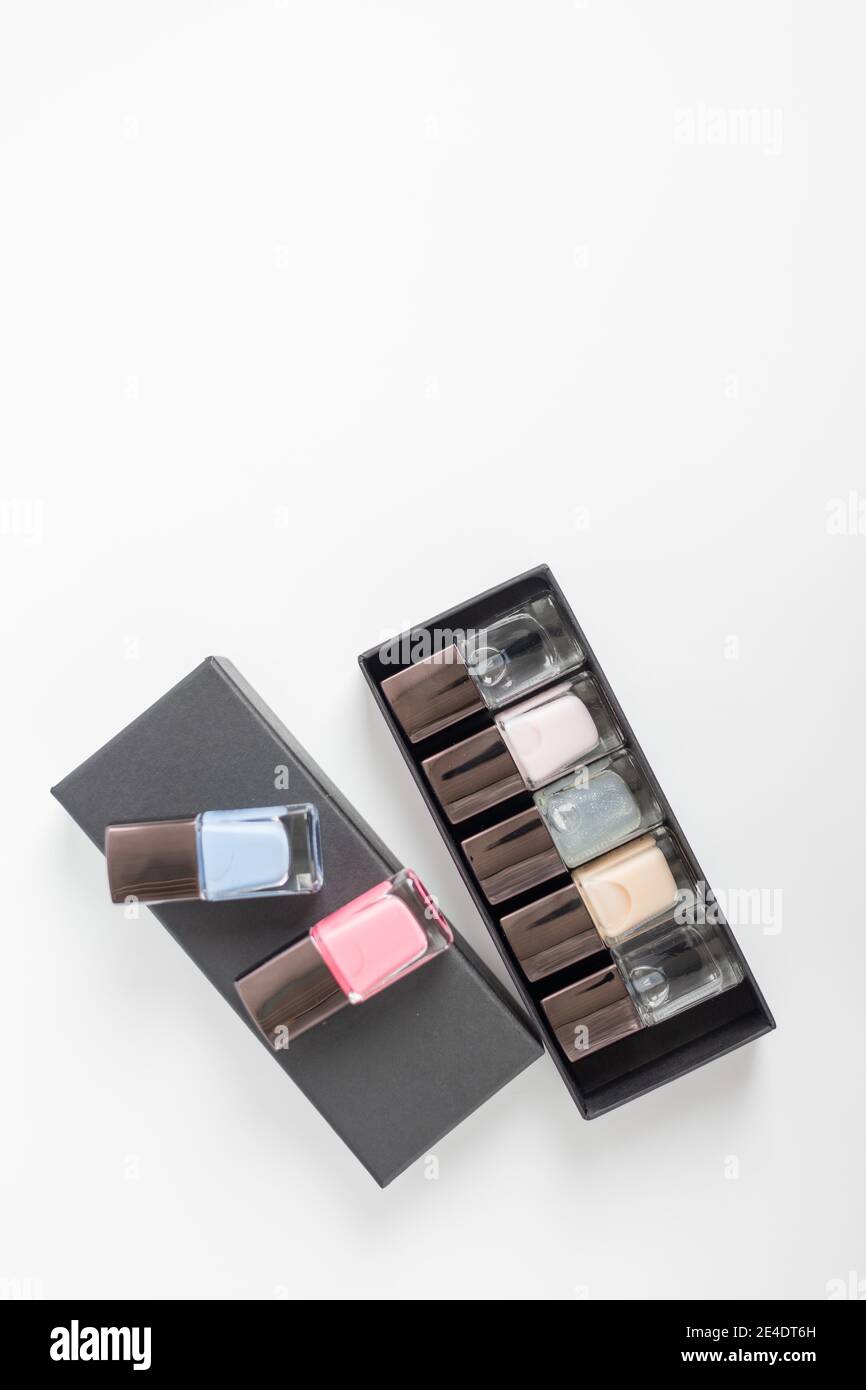 Collection of multi-colored bottles of nail polish. Layout for design ...