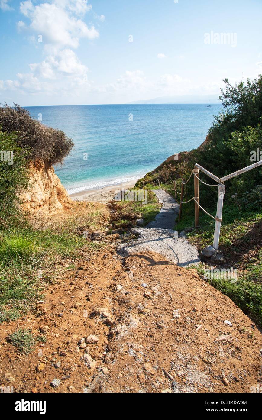 Amazing Sarantari Beach with vivid blue colors water and yellow sand in ...
