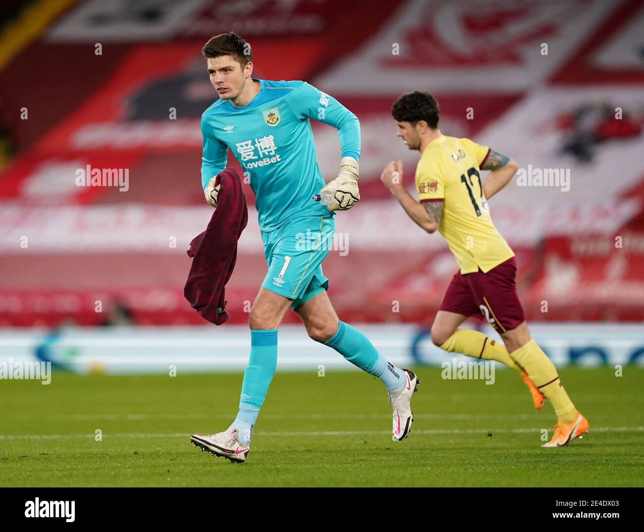 Burnley goalkeeper Nick Pope (left) leads out his side before the ...