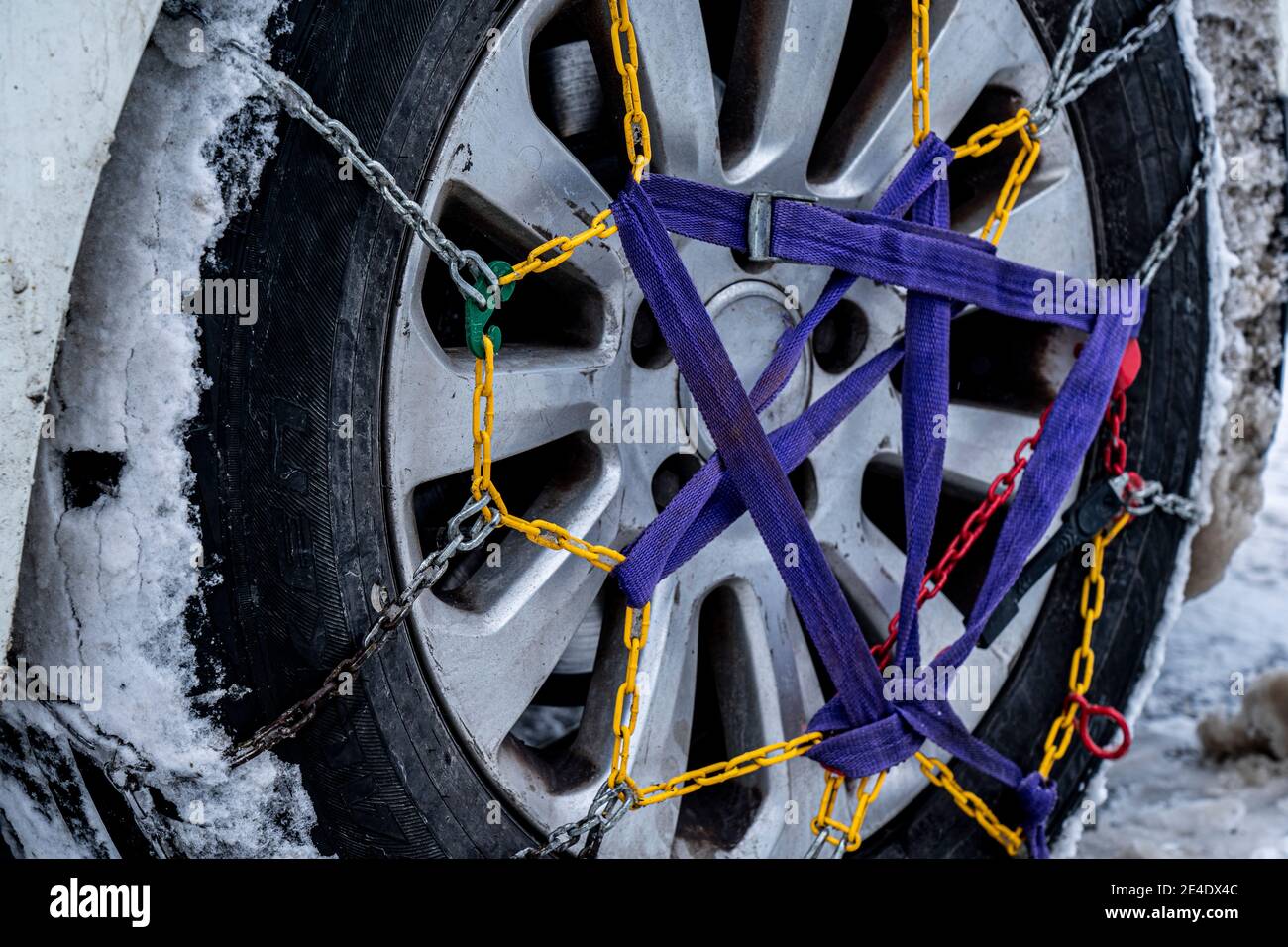 Car on icy road and chains hi-res stock photography and images - Alamy