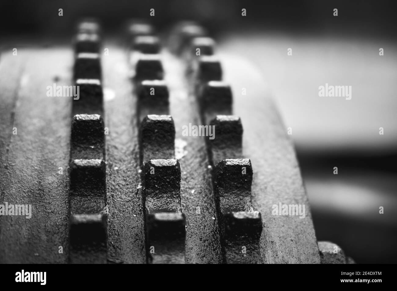 Grayscale closeup of three rows of gear teeth Stock Photo - Alamy