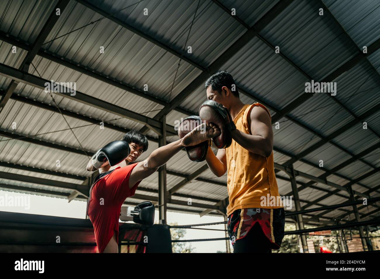 Boxer training coach in ring hi-res stock photography and images - Alamy