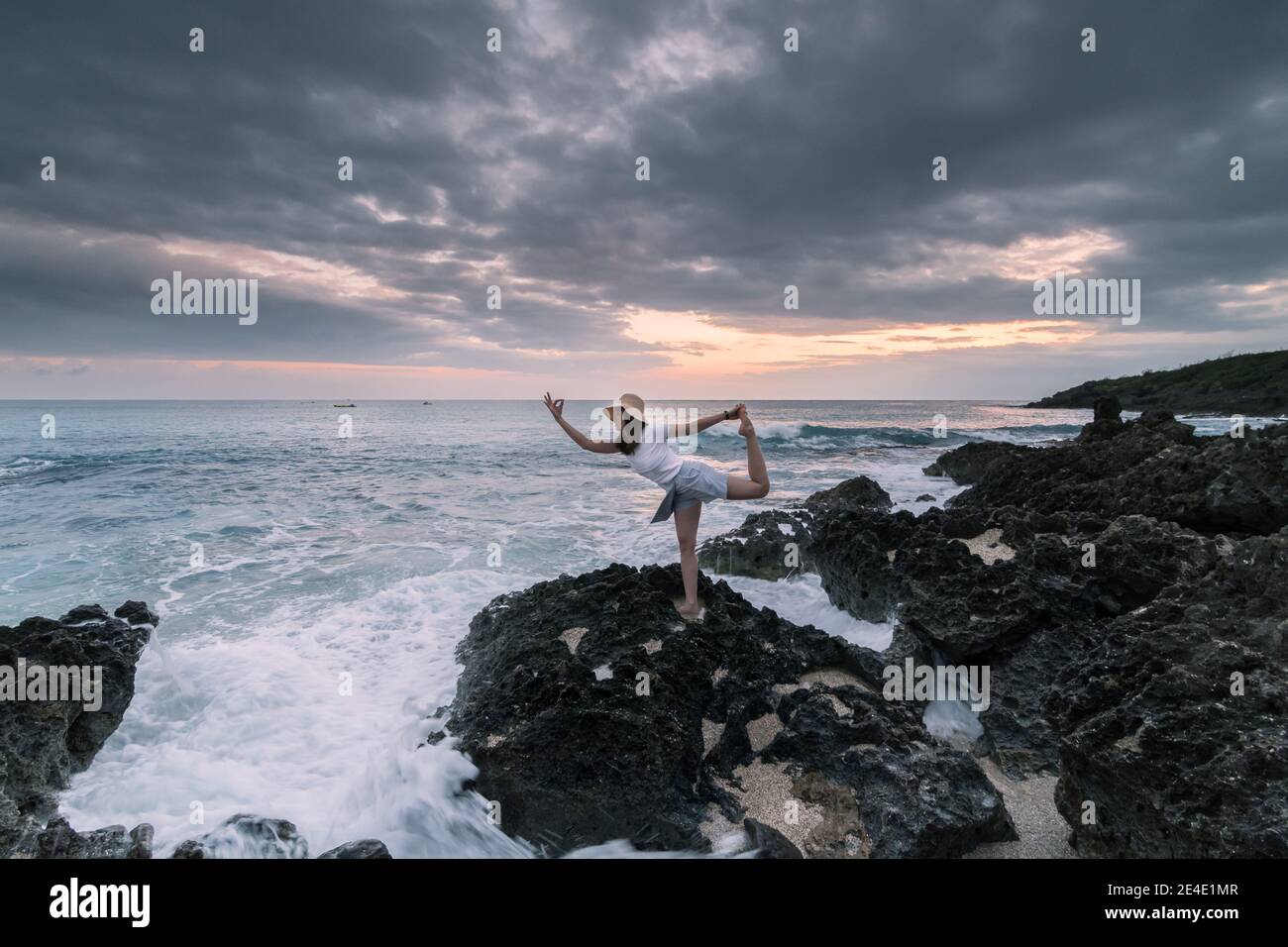 Beautiful tourist pose at rocky Coast along the Pacific Ocean, Kenting ...