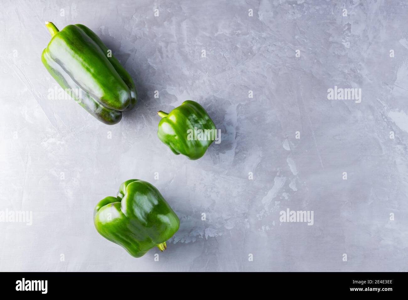Ugly bell pepper on ultimate gray background. Deformed homegrown green ...
