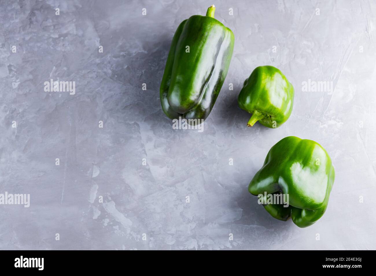 Ugly bell pepper on ultimate gray background. Deformed homegrown green ...