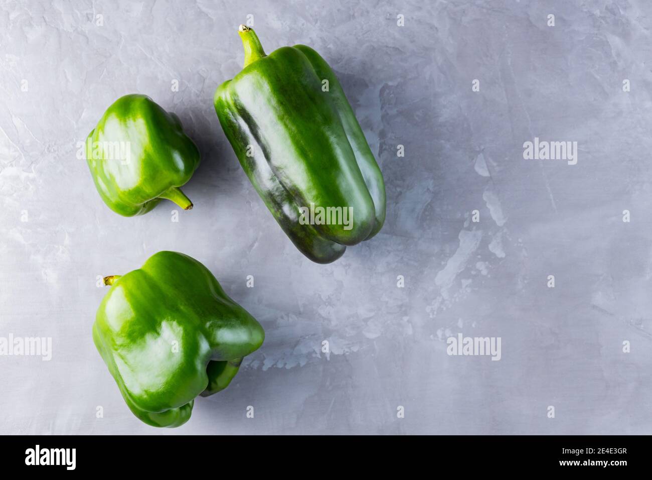Ugly bell pepper on ultimate gray background. Deformed homegrown green ...