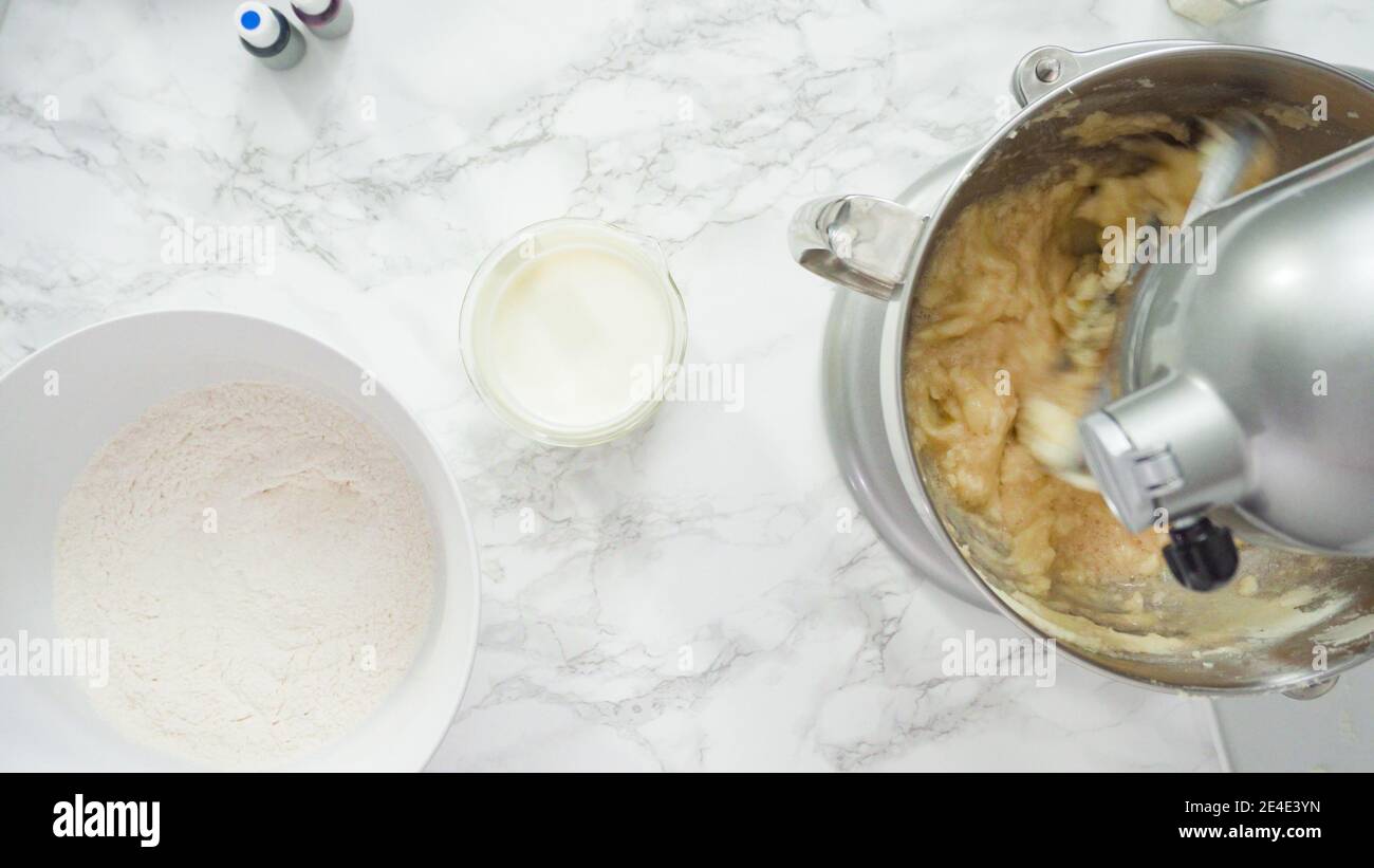 Step by step. Flat lay. Mixing ingredients in standing kitchen mixer to ...