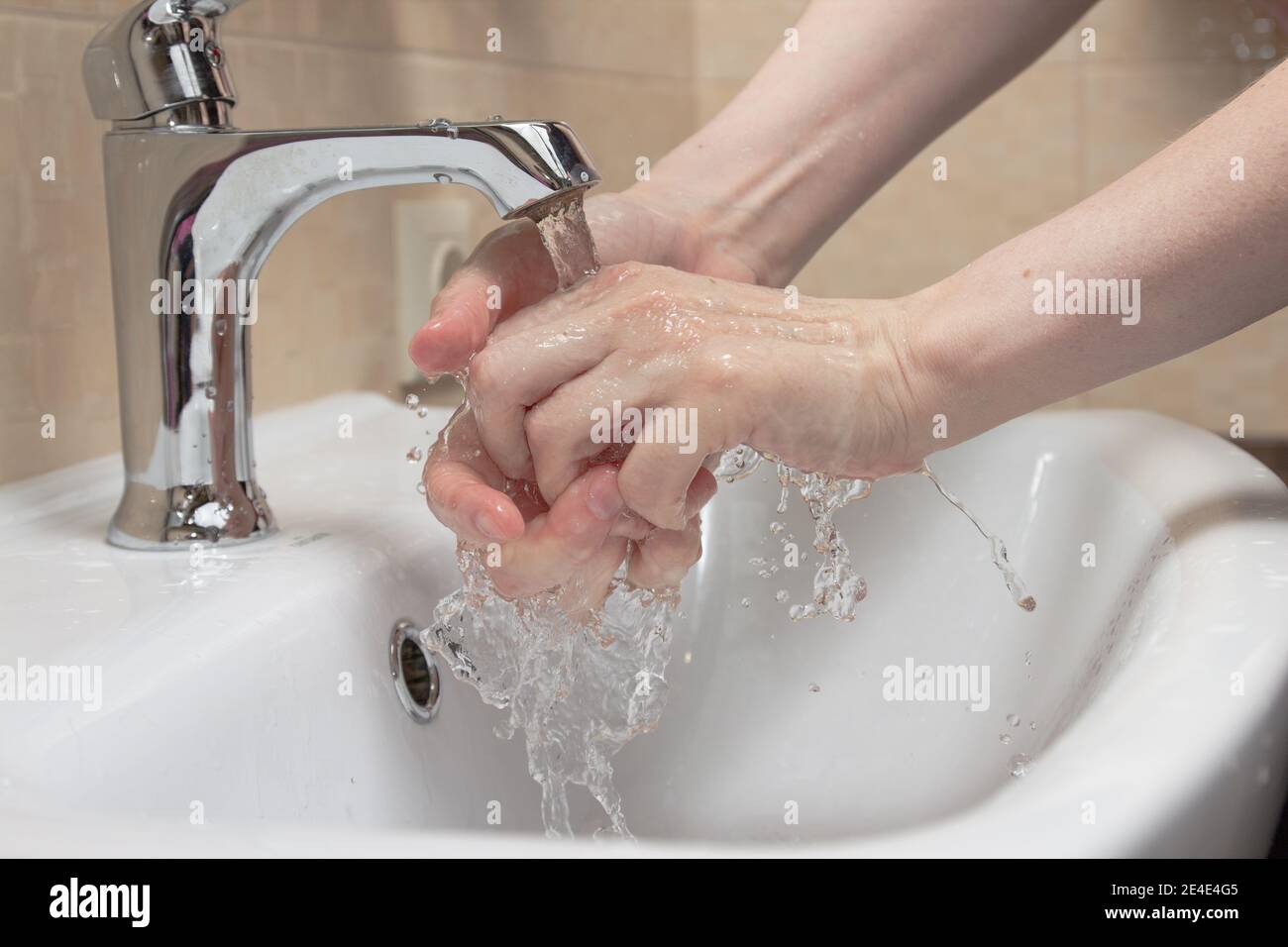 Hygiene. Cleaning Hands. Washing hands with clean water. Woman's hand ...