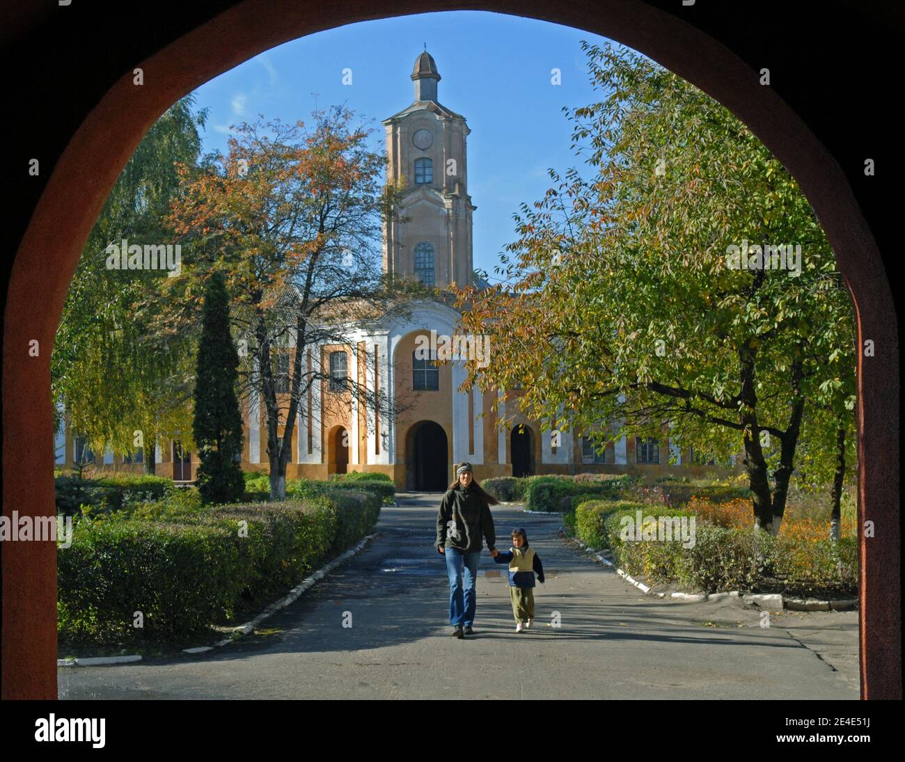 Radziwills residence in Olyka. View through gate. Bluw sky in ...