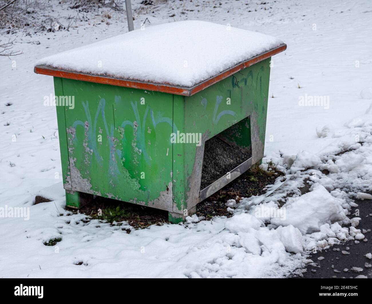 Grit container in winter with snow Stock Photo - Alamy