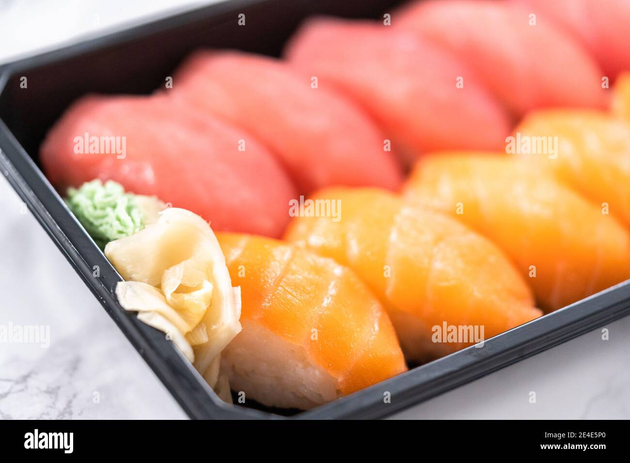 Pre-packaged sushi in a plastic tray Stock Photo - Alamy