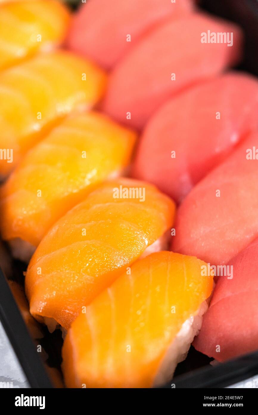Pre-packaged sushi in a plastic tray Stock Photo - Alamy