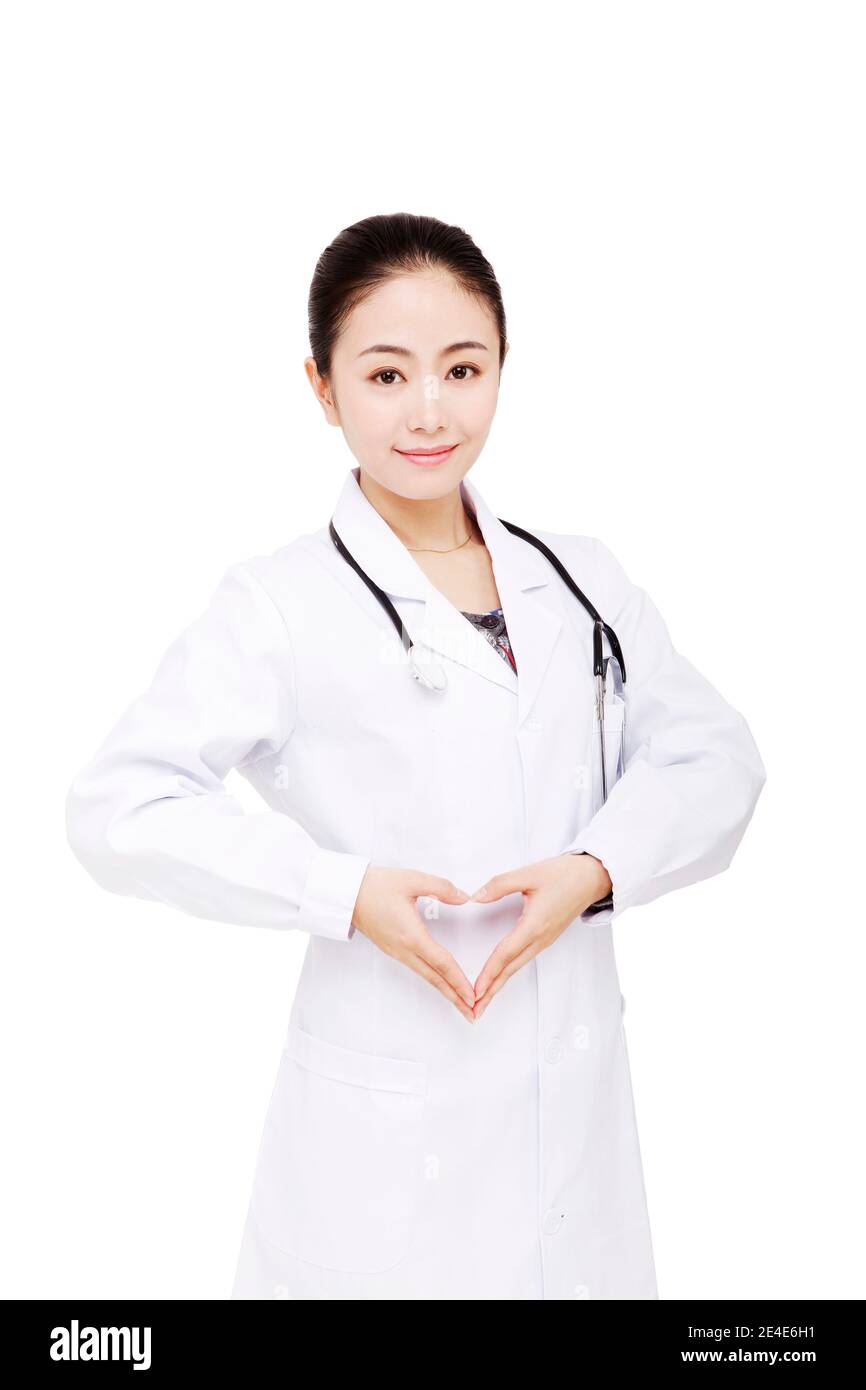 Young female doctor to make the heart sign East high quality photo Stock Photo - Alamy