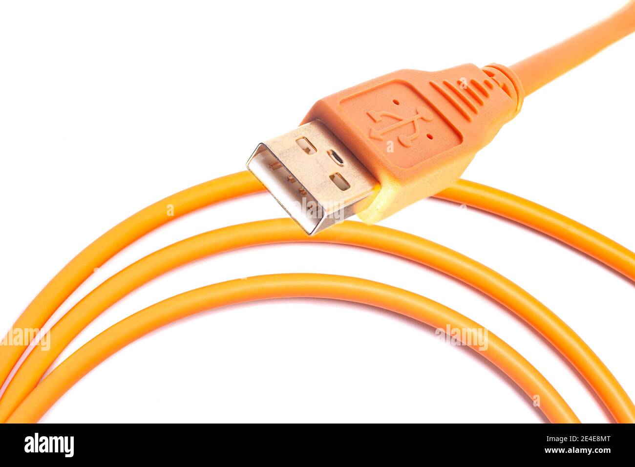 Orange USB rolled cable isolated on white background Stock Photo - Alamy