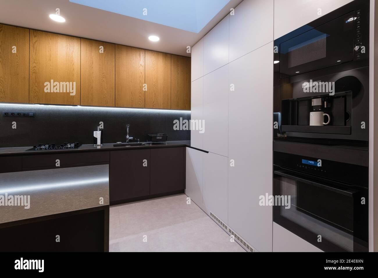 Interior of modern kitchen with built-in appliances in a house Stock ...