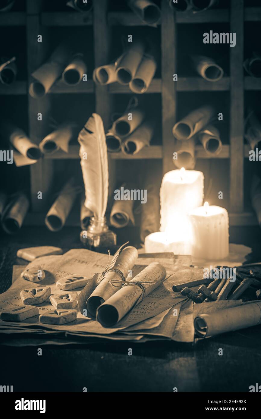 Magic and ancient library full of medieval and old scrolls Stock Photo ...