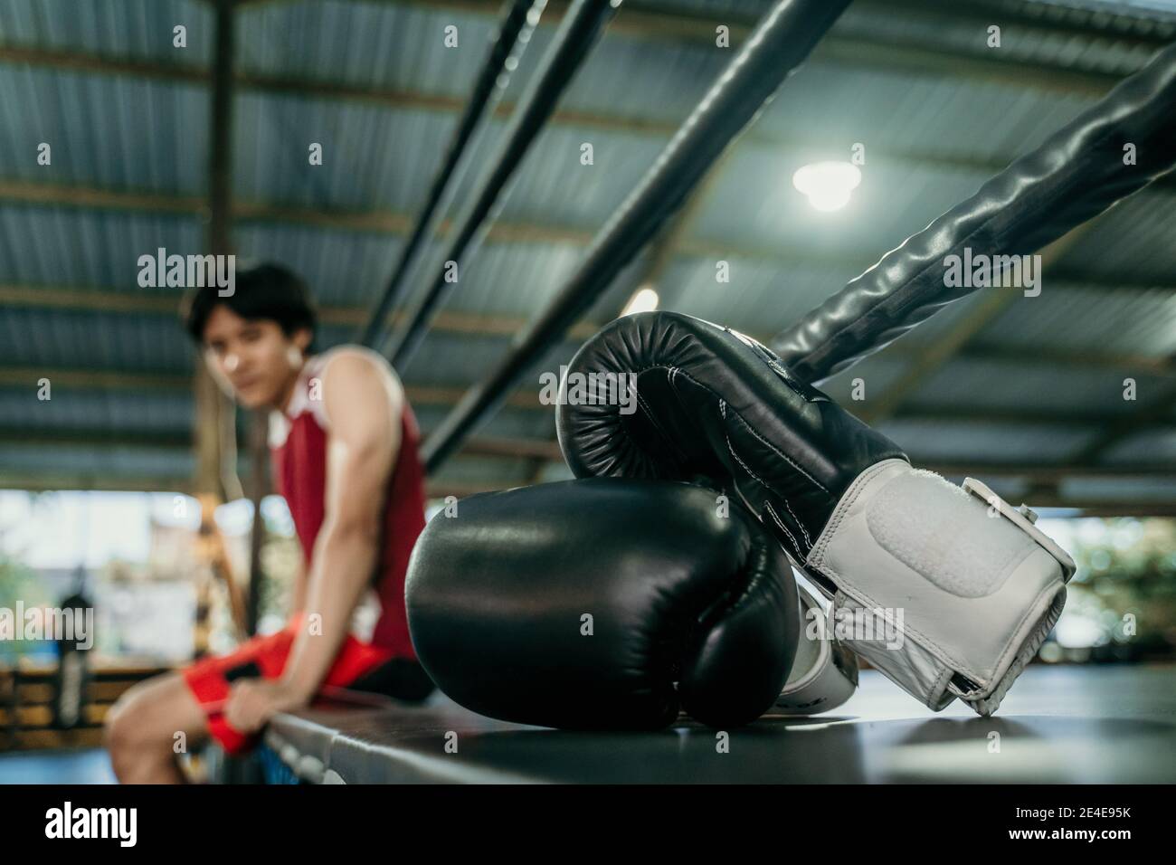 black boxing gloves on boxing ring in gym. Sports equipment for ...