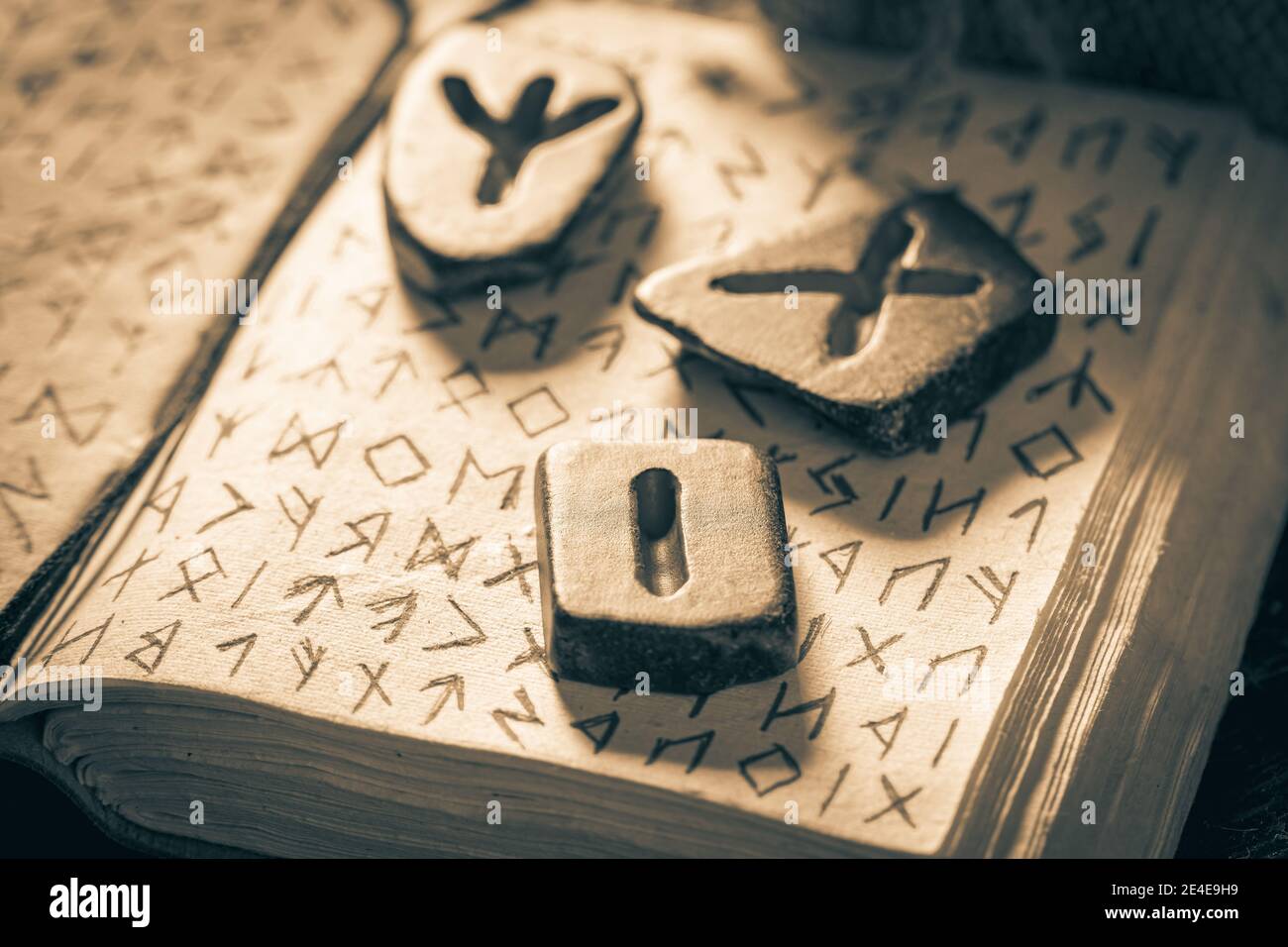 Closeup of vintage runic divination by stones based on ancient language ...