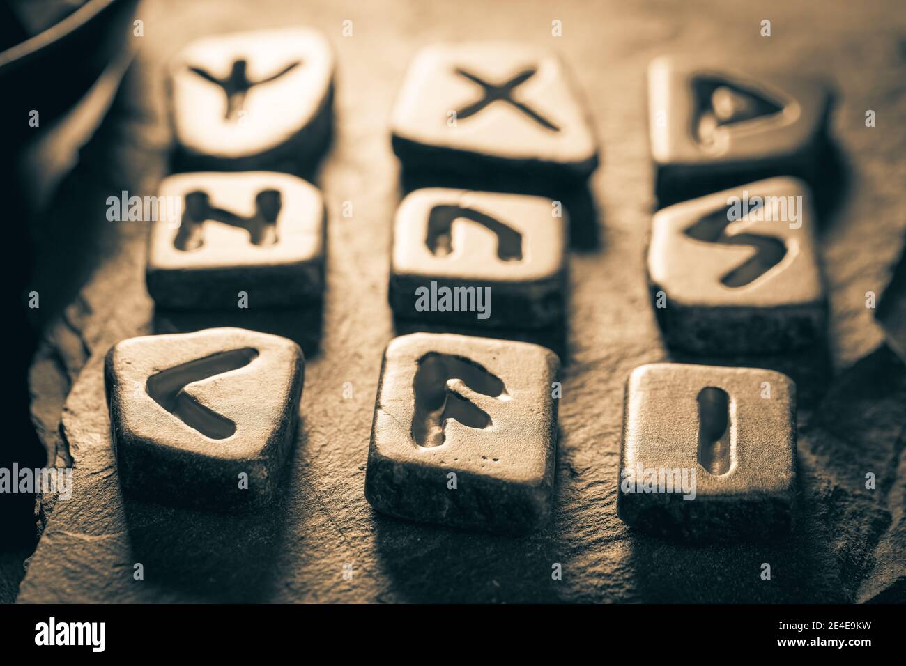 Closeup of strange divination by rune stones made of Celtic language Stock Photo - Alamy
