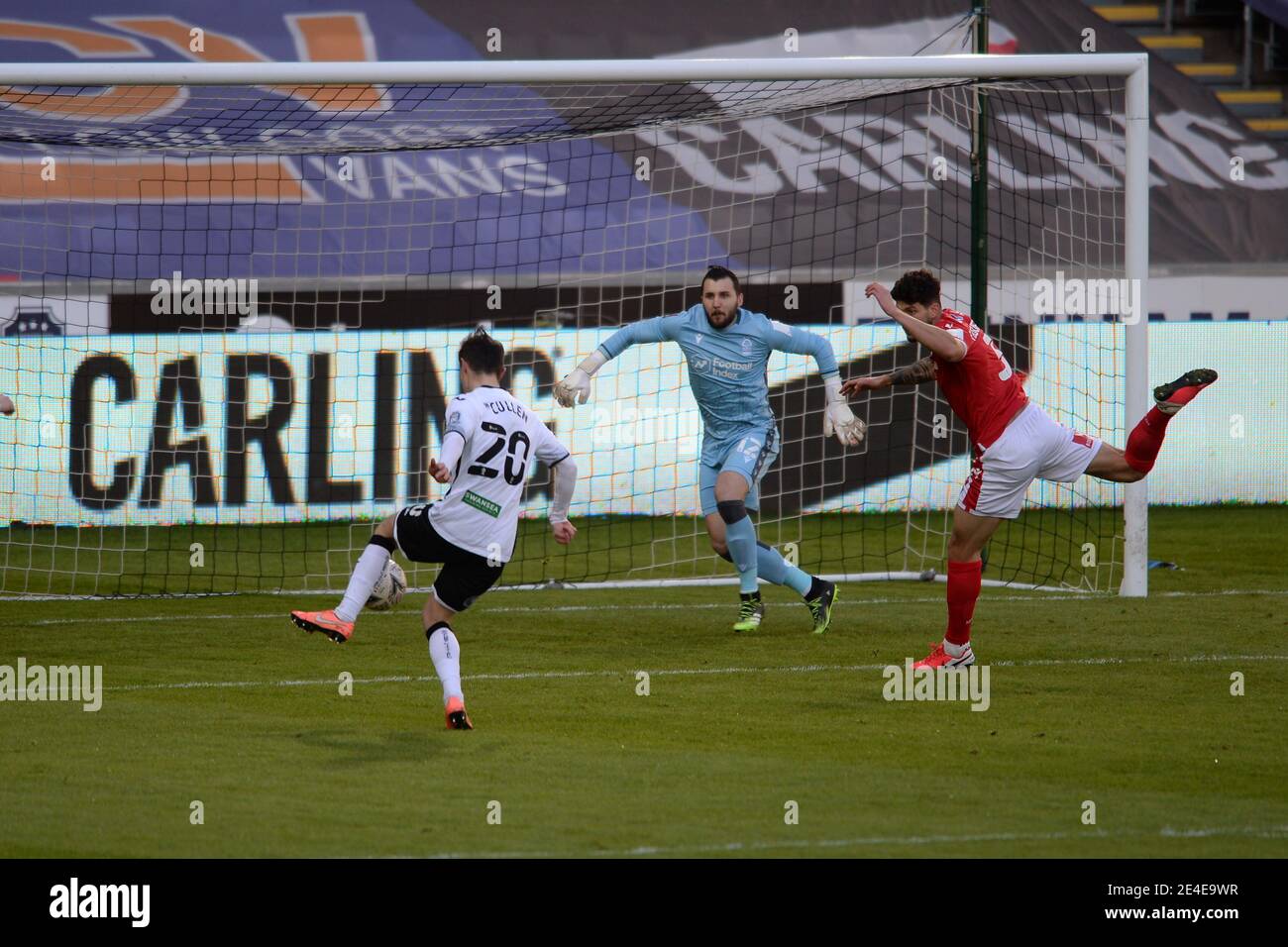 SWANSEA, WALES. JAN 23RD Liam Cullen of Swansea City strikes for goal ...
