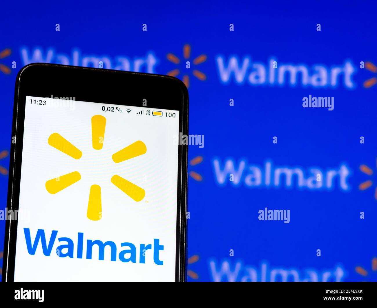 In this photo illustration a Walmart logo seen displayed on smart phone ...