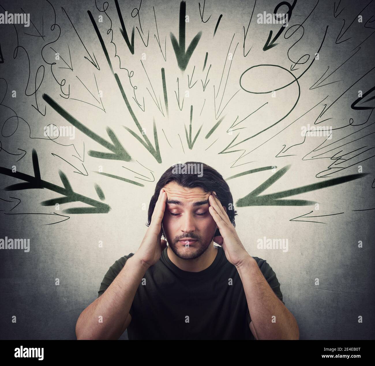 Exhausted man keeps hands to temples, eyes closed, feels headache being ...