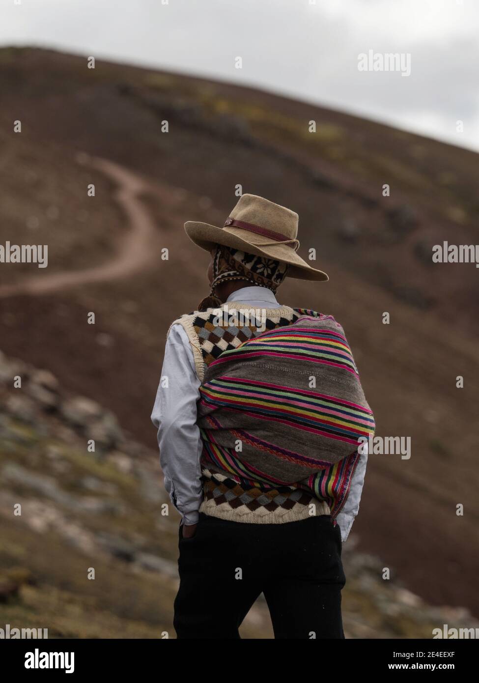 Peruvian man in traditional andean indigenous clothes at Cordillera de ...