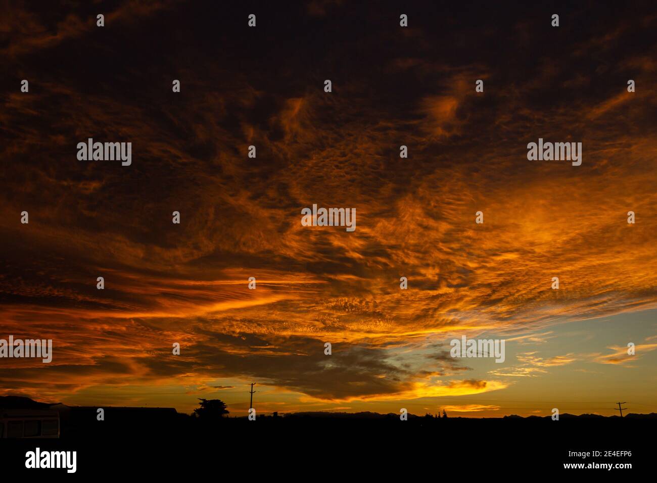 Beach in Nelson during a breathtaking sunset on Tahunanui Beach at ...