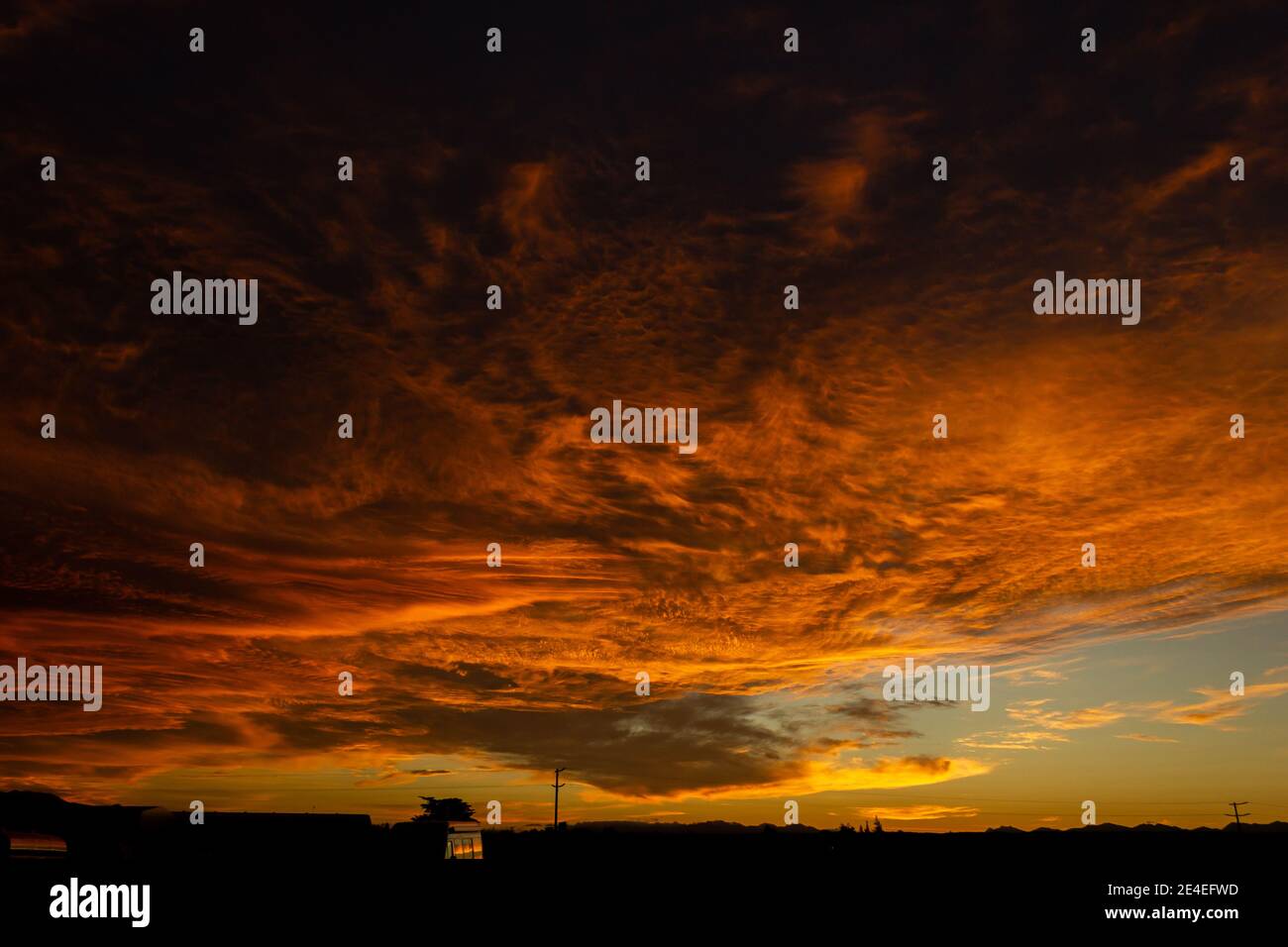 Beach in Nelson during a breathtaking sunset on Tahunanui Beach at ...