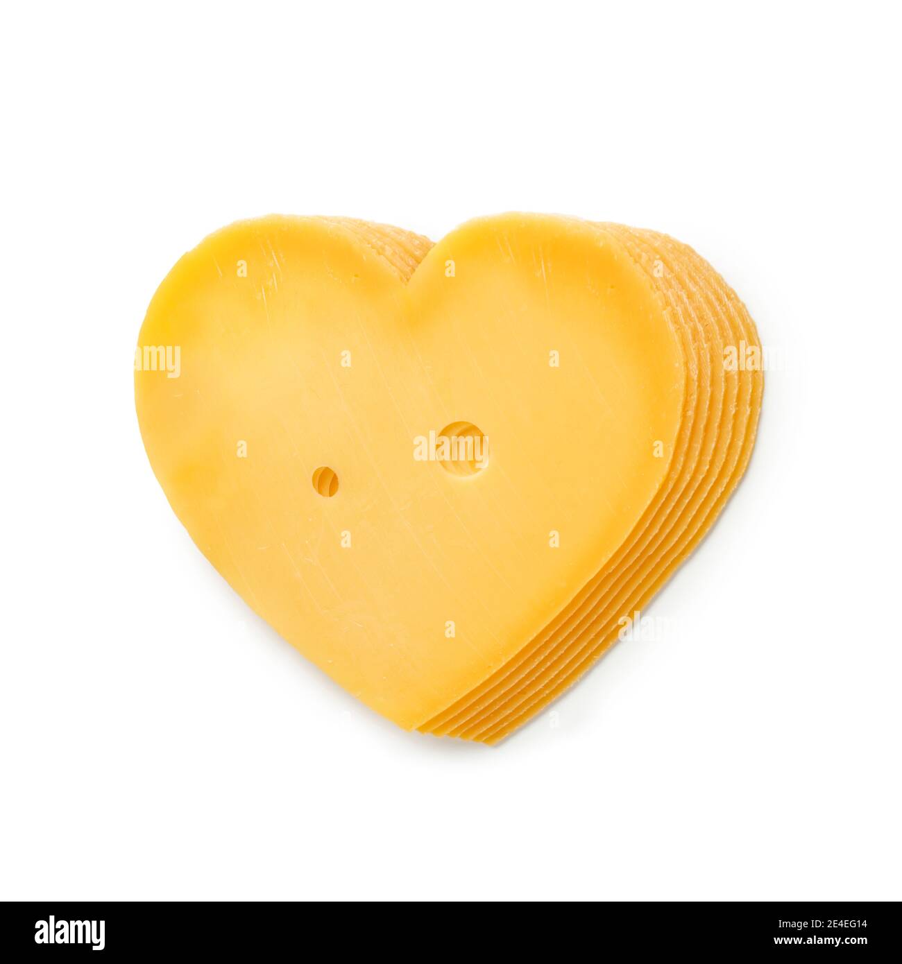 Heart shaped slices of Dutch Gouda cheese close up close up isolated on ...