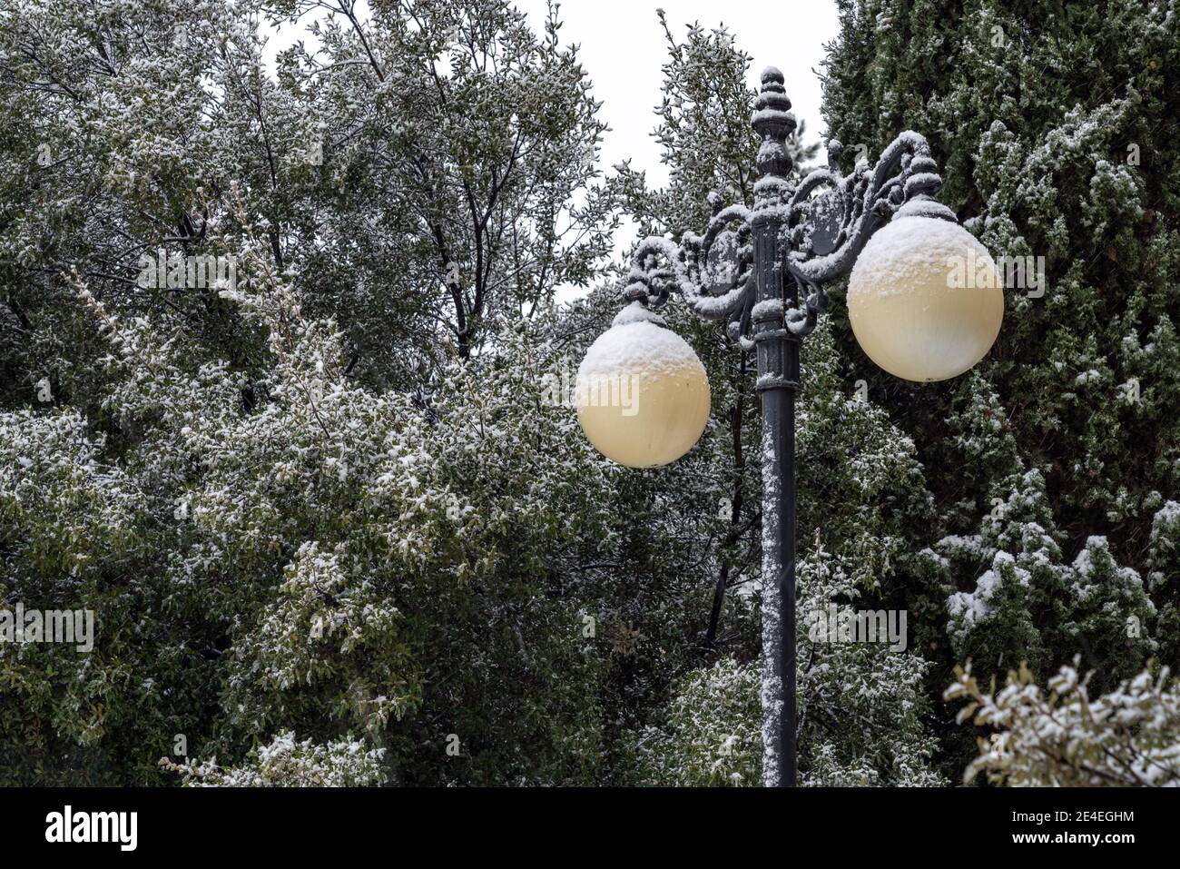 Street lamp covered with snow Stock Photo - Alamy