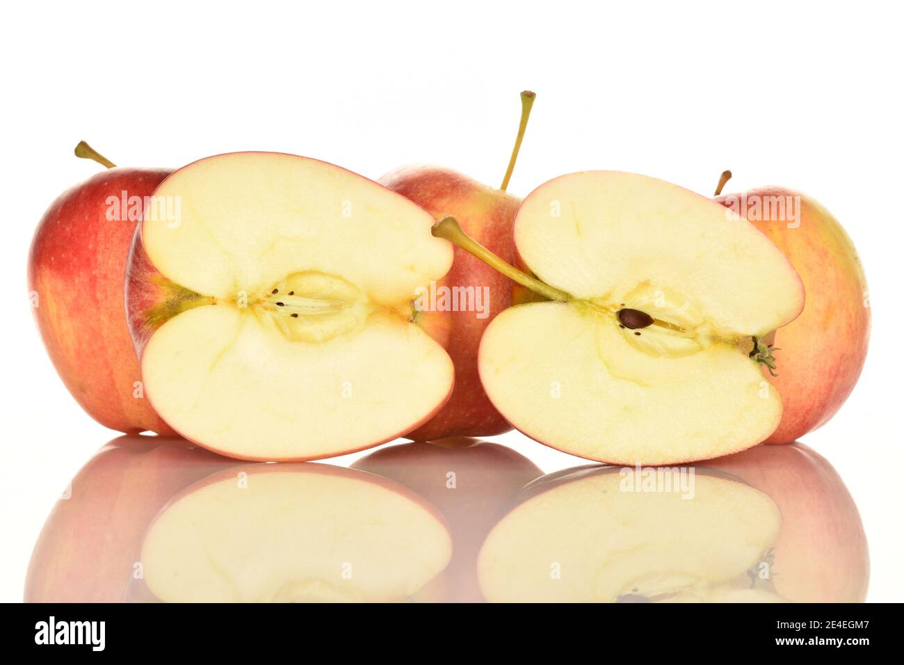 Two halves of an apple, in focus, red tasty ripe juicy apple, on a ...